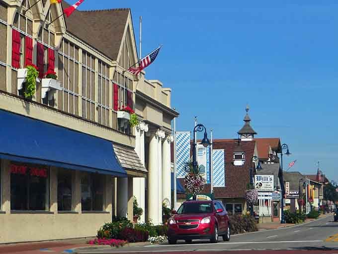 Bavarian flags and flower boxes line Frankenmuth's sunny main street, where schnitzel dreams and chicken dinners become gloriously real.