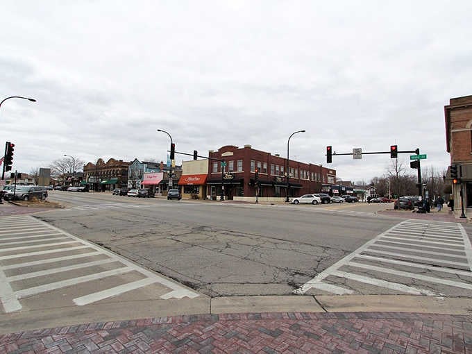 Wide intersections and brick crosswalks create a downtown where pedestrians rule and nobody's rushing through red lights.