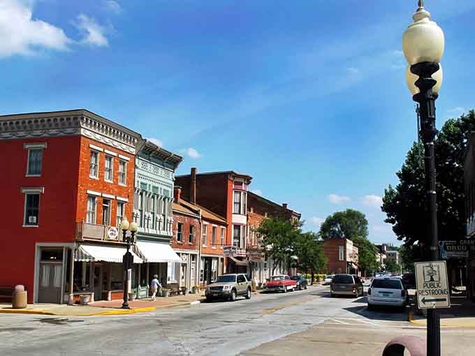 Hannibal's sun-drenched main street glows with the warm red brick energy of a town that knows its own worth.