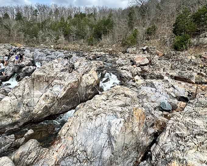 The Black River squeezes through ancient volcanic rock at Johnson's Shut-Ins, putting on a white-water show that Mother Nature choreographed herself.