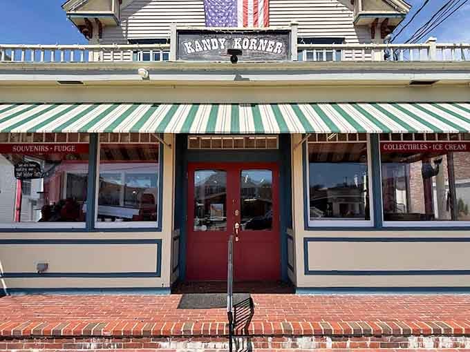 That bold green-striped awning and red door on Main Street say one thing loud and clear: fudge is waiting inside.