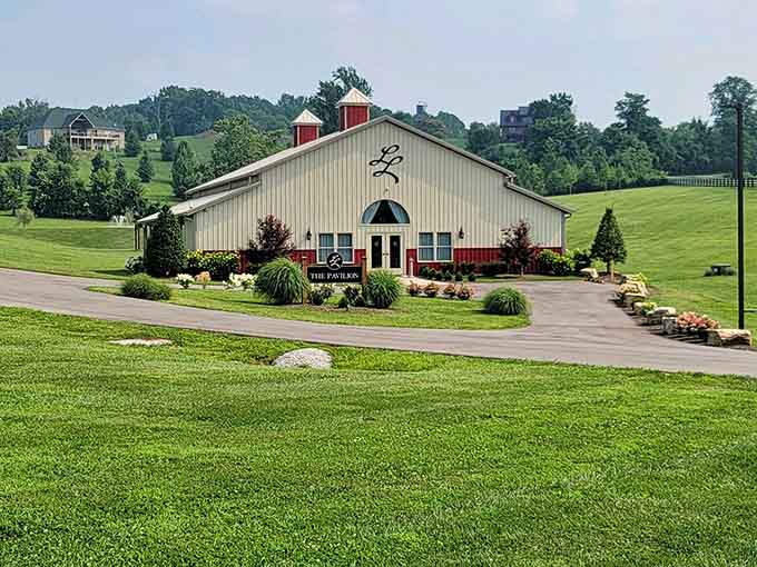 Rolling green hills, a red-trimmed barn, and a sign that reads "The Pavilion" — Kentucky really outdid itself here.