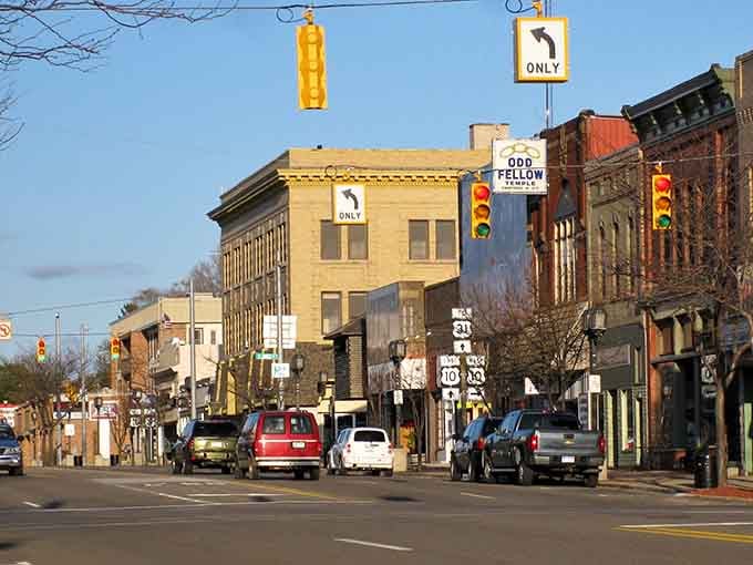Golden hour bathes historic storefronts in warm light, making every brick building glow like a vintage postcard.