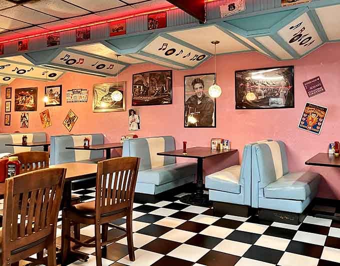 Retro vibes await you at Old Time Diner, where checkerboard floors, classic booths, and Elvis posters bring back the fifties.