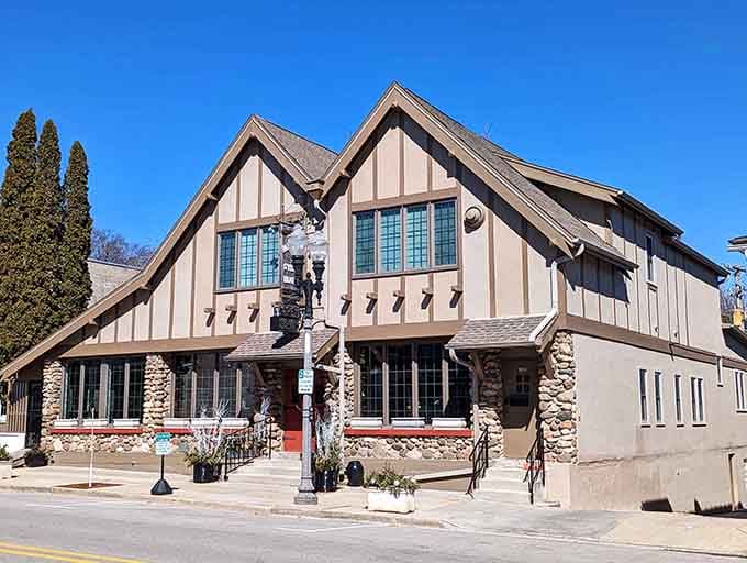 Palmer's Tudor-style stone columns and soaring roofline prove that Hartland has been quietly winning the architecture game all along.