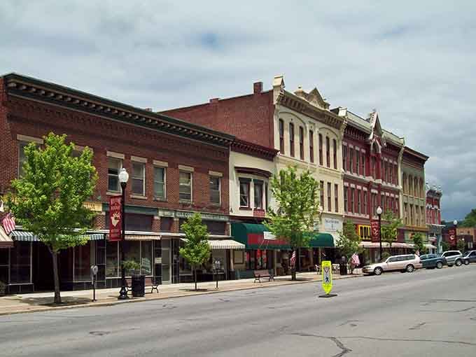 Ridgway's historic storefronts line up like colorful soldiers, each building telling its own architectural story with pride.
