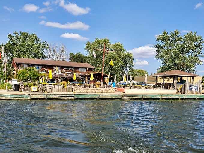 Yellow umbrellas, rippling water, and a dock that practically begs you to tie up and stay awhile.