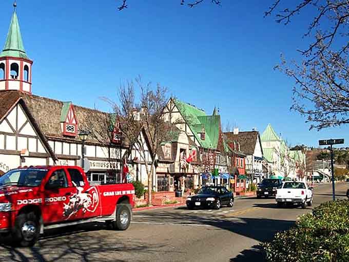 Half-timbered buildings and green copper rooftops line Solvang's main street, proving Denmark relocated to California wine country.