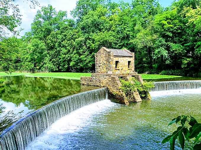 That stone pumphouse perched over the cascading water looks like something from a European postcard, doesn't it?