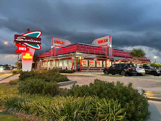 When neon meets stormy Gulf Coast skies, you know this diner means serious, delicious business.