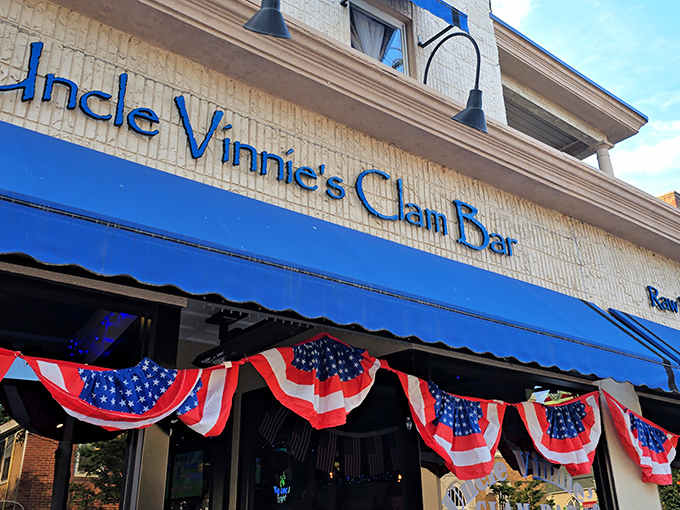 Patriotic bunting and a bold blue awning make Uncle Vinnie's look like the most festive clam bar on the block.