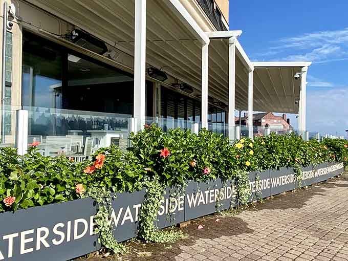 Hibiscus blooms and a covered pergola tell you Waterside means serious business about outdoor dining.