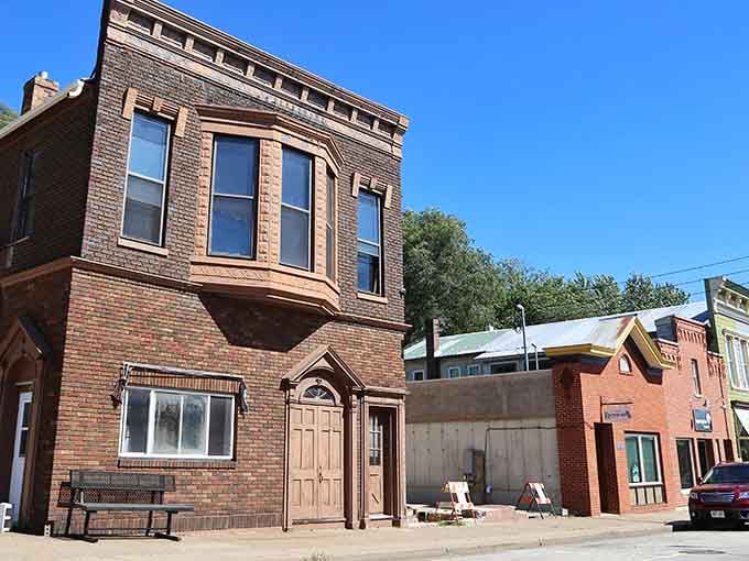 That brick facade has seen generations pass by, standing solid while the world changed around it like a faithful friend.