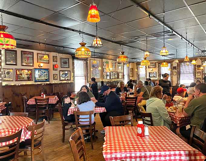 Checkered tablecloths, Tiffany lamps, and a packed house — Arthur's dining room has the joyful energy of a family reunion.
