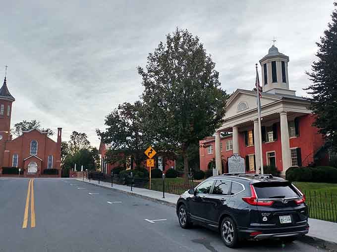 Twilight settles gently over Berryville's courthouse and church, two pillars of community standing side by side like old friends.