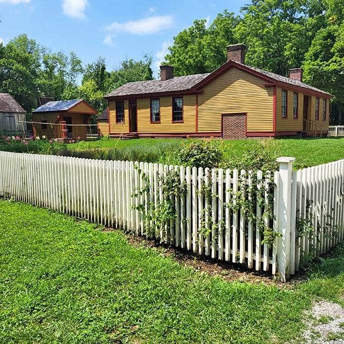 That crisp white picket fence and sunny yellow farmhouse make the 1800s look surprisingly inviting and cheerful.