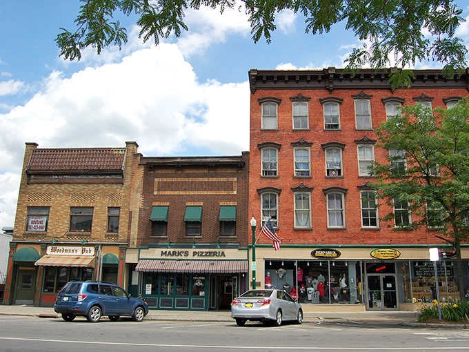 Pizza, a pub, and a flag waving proudly overhead, Cortland's main street has its priorities absolutely straight.