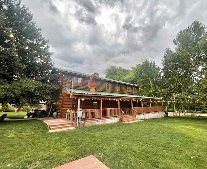 Even under stormy skies, DA Ranch's glowing porch lights promise warmth, good wine, and great company inside.