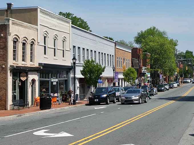 Tree-lined sidewalks and mismatched storefronts give Davidson's downtown a lived-in warmth that no new development could ever replicate.