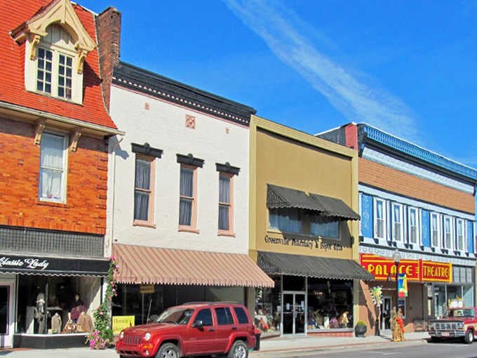 Under brilliant blue skies, this downtown strip showcases the kind of authentic character that chain stores could never replicate.