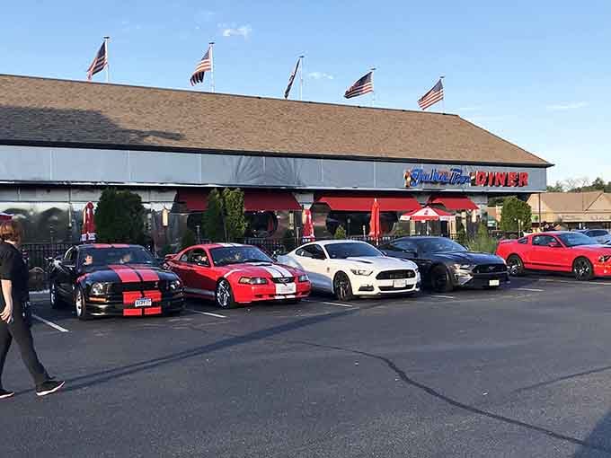A row of gleaming Mustangs parked out front tells you everything about the crowd this classic diner attracts.