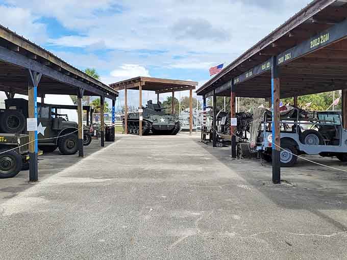 Jeeps, tanks, and military vehicles lined up under open shelters, each one carrying a story worth hearing.