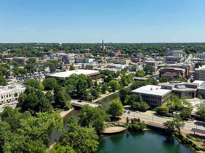 Green trees, winding river, and a skyline that breathes, Naperville from above looks like nature and city finally agreed on something.