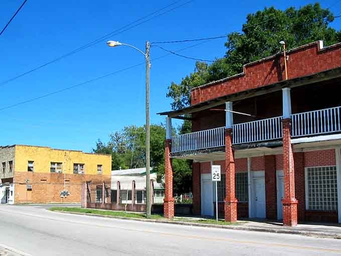 That two-story brick building with the wraparound balcony isn't just pretty — it's Palatka saying "we have stories."