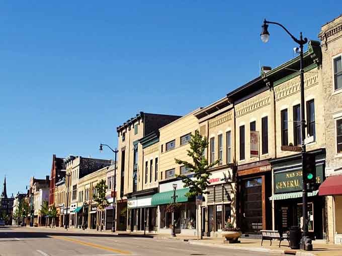 Warm brick buildings and young trees line Racine's main street, creating a downtown that feels both historic and full of life.