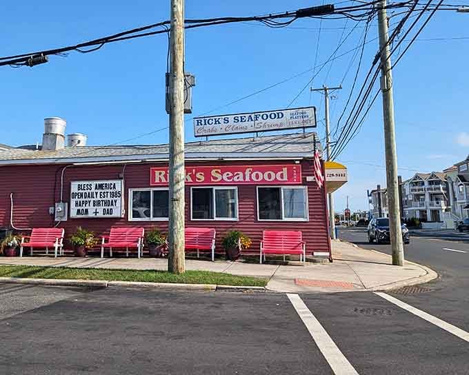 Under a wide blue sky, those bright red benches out front practically dare you to sit down and stay awhile.