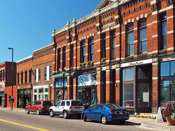 Sunlight catches every architectural detail on these beautifully preserved storefronts lining the historic downtown streets.