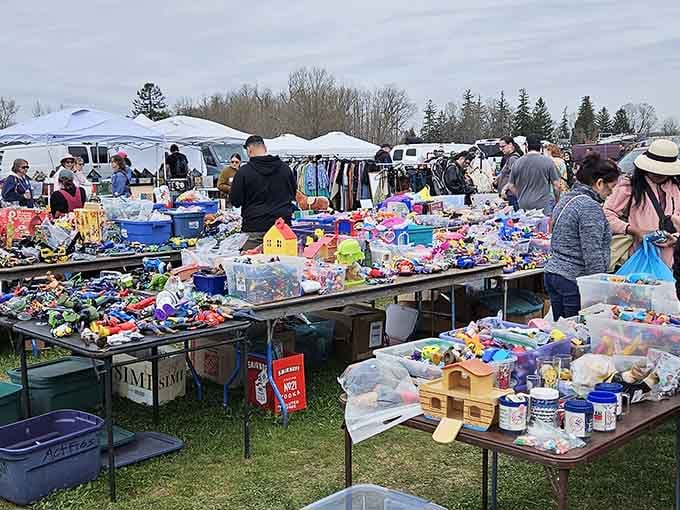 Tables overflowing with colorful toys stretch across the field, making every kid feel like it's Christmas morning.