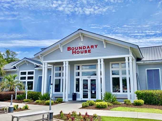 Crisp white columns, coastal charm, and a bold red sign that means serious business near the Carolina border.