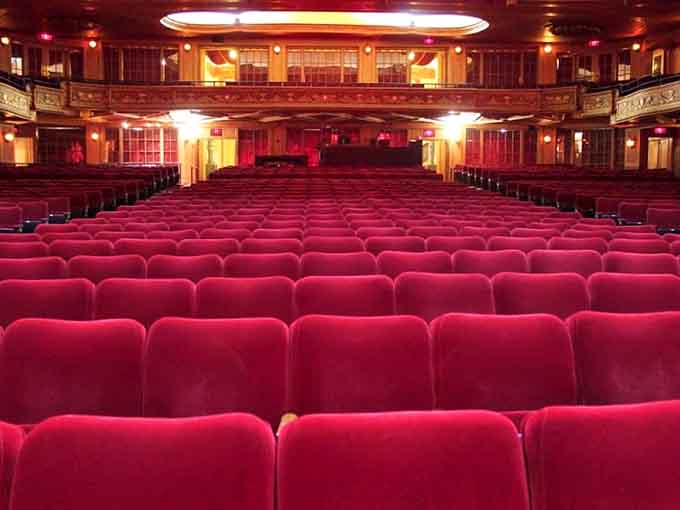Row after row of deep red velvet seats, each one a front-row seat to nearly a century of memories.