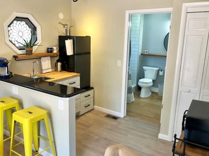 That kitchenette corner proves good design and a great fridge can coexist beautifully in a small space.