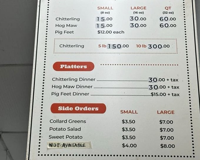 A menu board that means business. From breakfast sandwiches to chitterlings, this is soul food done right.