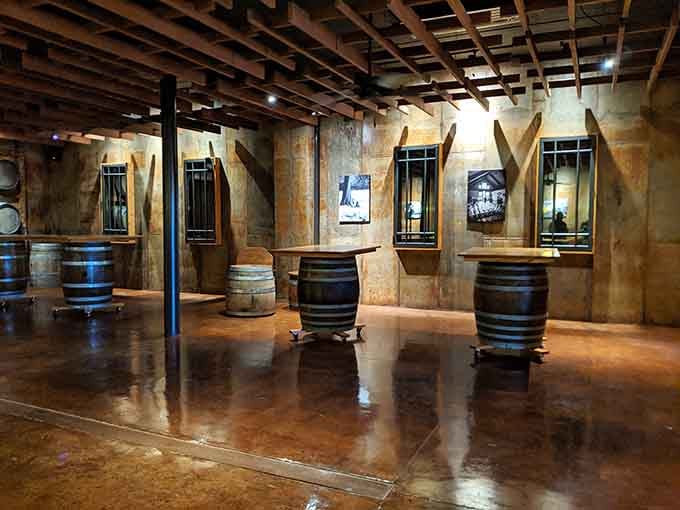 Wine barrels as bar tables is either genius or someone really committed to the theme—either way, it works.