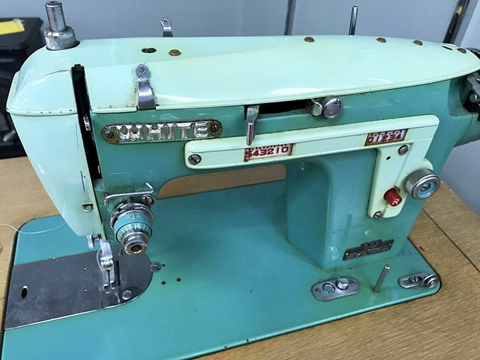 This mint-green vintage White sewing machine is the kind of find that makes seasoned thrifters do a happy dance.