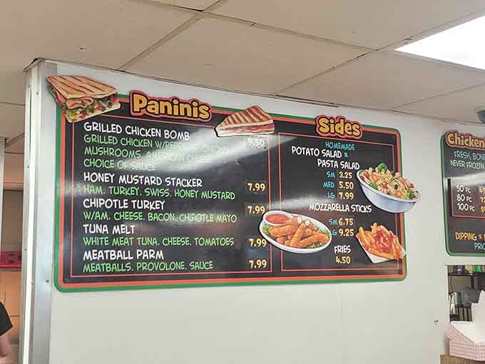 A menu board worth studying carefully, because every single panini and side listed here is a decision you'll be glad you made.