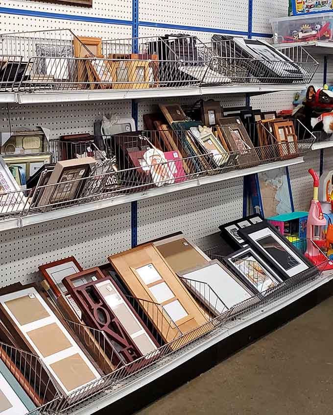Frames waiting for new memories, stacked up like chapters in someone else's photo album.
