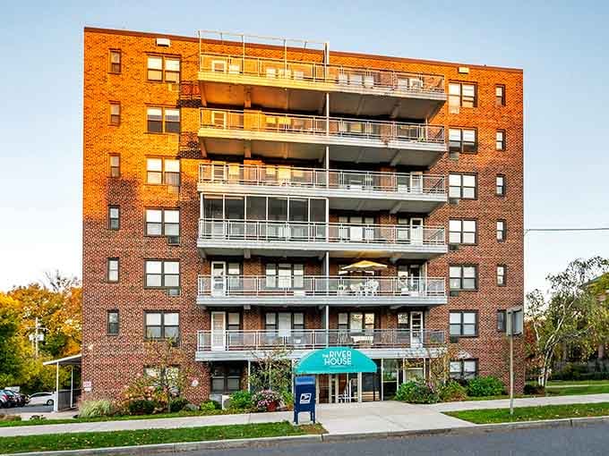 The River House sits pretty by the water, balconies and all, for a fraction of big-city rent.