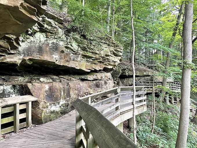 Wooden walkways hugging ancient cliff faces, because sometimes the path to something beautiful is beautiful itself.