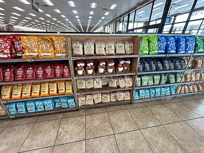 Colorful bags of popcorn stretch endlessly, with cheerful beaver plush toys keeping watch over the whole delicious display.