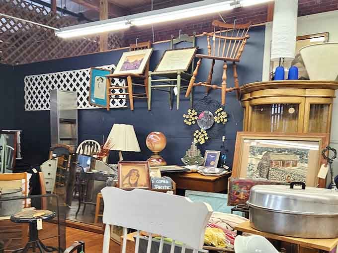 Chairs on walls, lamps on tables, and stories everywhere you look. This is organized chaos at its finest.