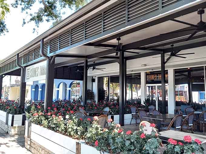 Outdoor dining with flowers blooming and zero pretension, because paradise shouldn't require a reservation three months out.