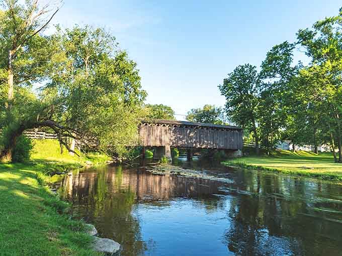 The covered bridge isn't just Instagram bait, it's a genuine slice of history spanning Cedar Creek with timeless charm.