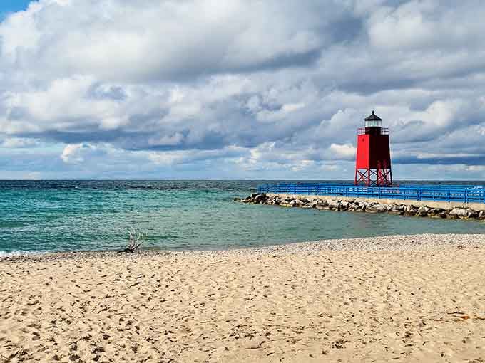 Michigan Beach Park's red lighthouse stands guard over sand and surf that'll make you forget oceans exist entirely.
