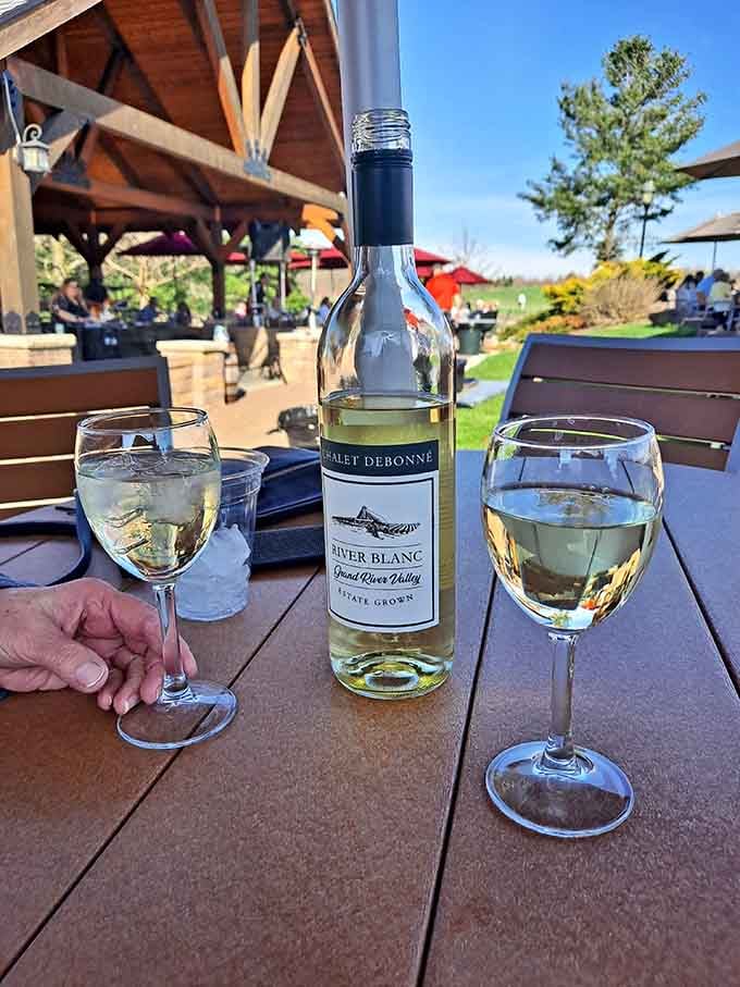 A bottle of estate-grown River Blanc and two glasses. Honestly, what else do you need?