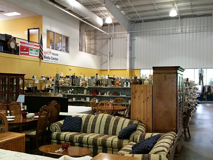 Cabinets, dining sets, and a leather sofa greet you near the exit, proof that Durham Rescue Mission Thrift Store surprises you everywhere.