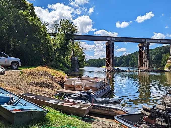 Old iron trestle bridges and pontoon boats share the same stretch of river, and somehow it all works perfectly.